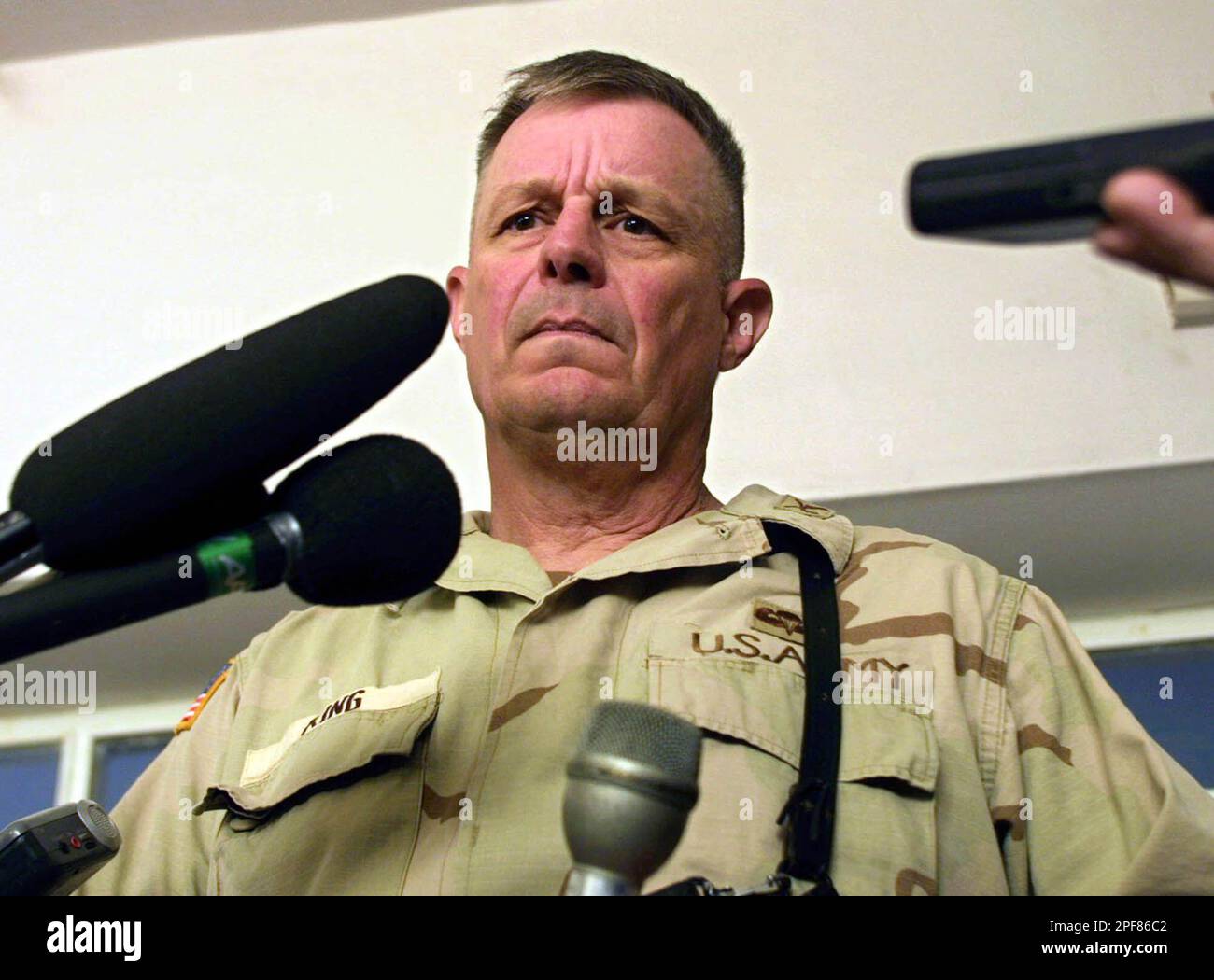 U.S. Army spokesman Col. Roger King speaks at a press briefing in ...