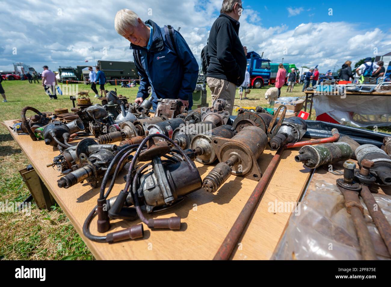 Man looking at second had starter motors in the autojumble at Kelsall ...