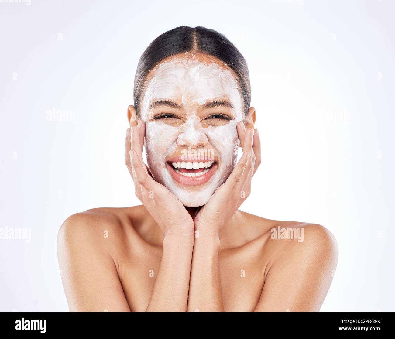 Looking good feels even better. a young woman posing against a studio ...