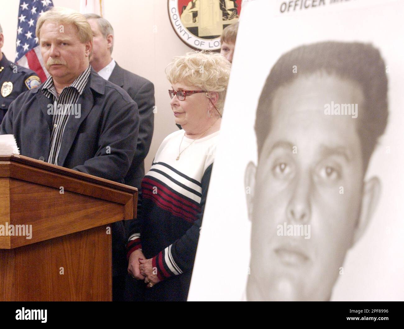 Keith Curtis, with his mother, Jean Curtis, at his side, speaks during ...