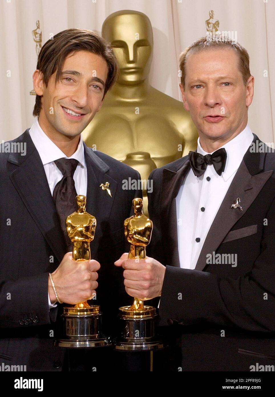 Best actor Adrien Brody, left, and best supporting actor Chris Cooper ...