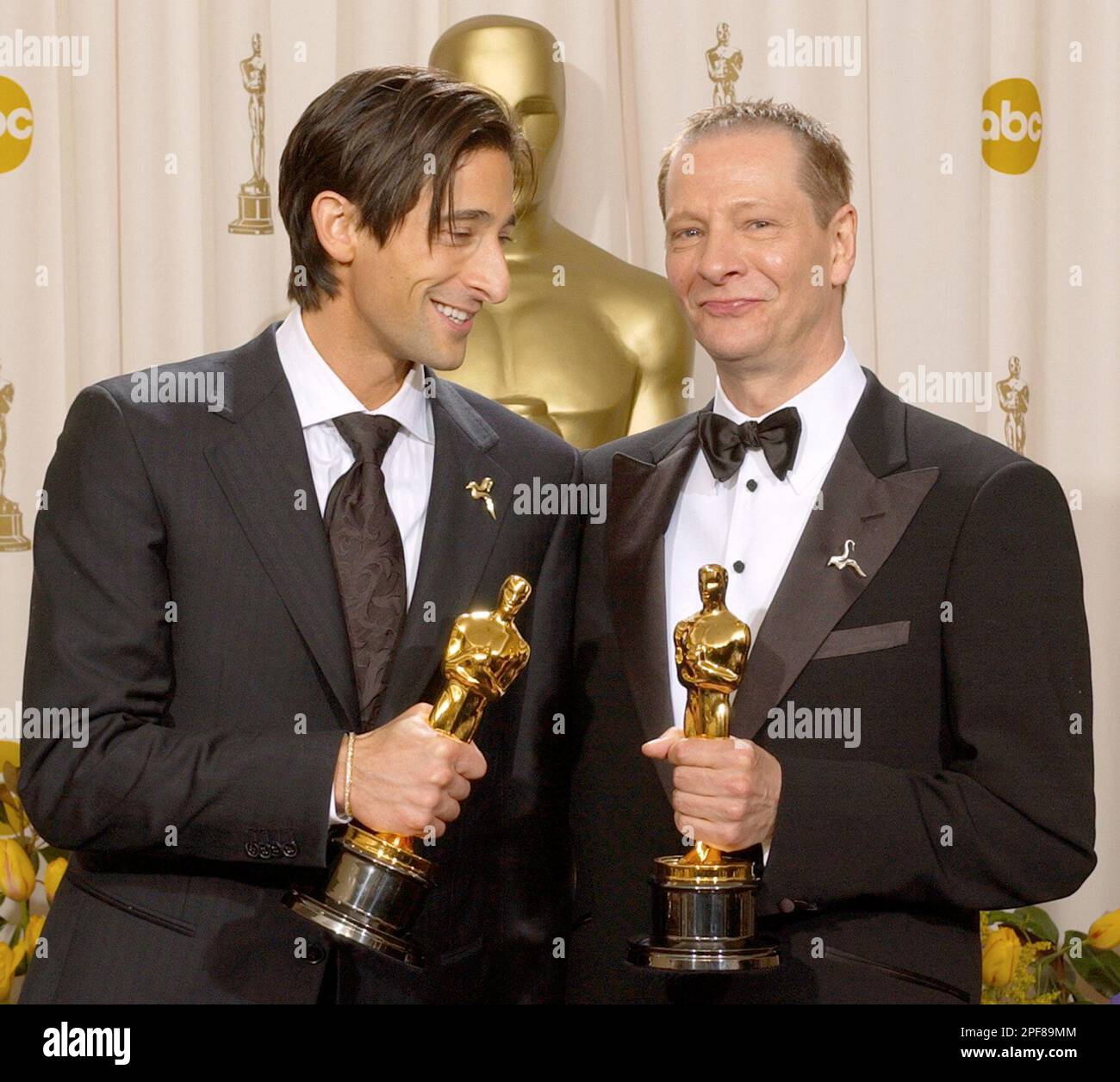 Best actor Adrien Brody, left, and best supporting actor Chris Cooper ...