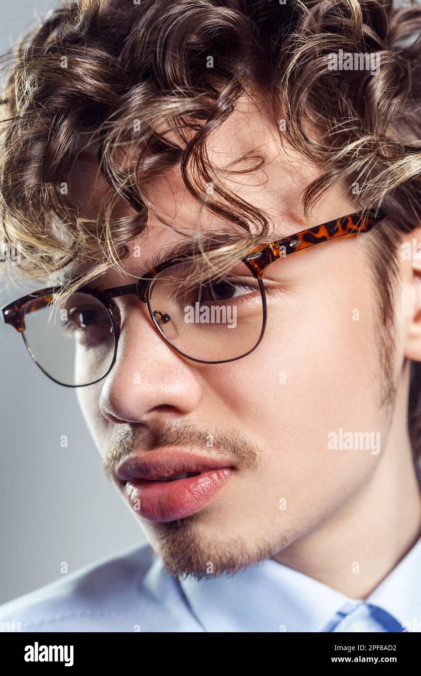 Closeup portrait of handsome strict man with mustache wearing blue ...