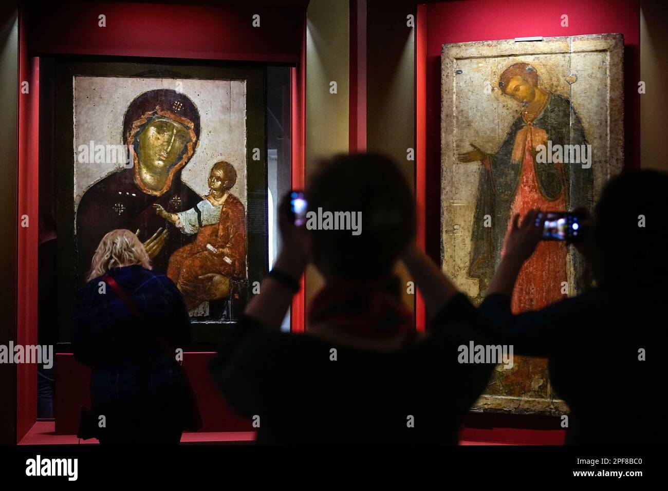 Visitors take photos of icons during The Heavenly Host, Image and ...