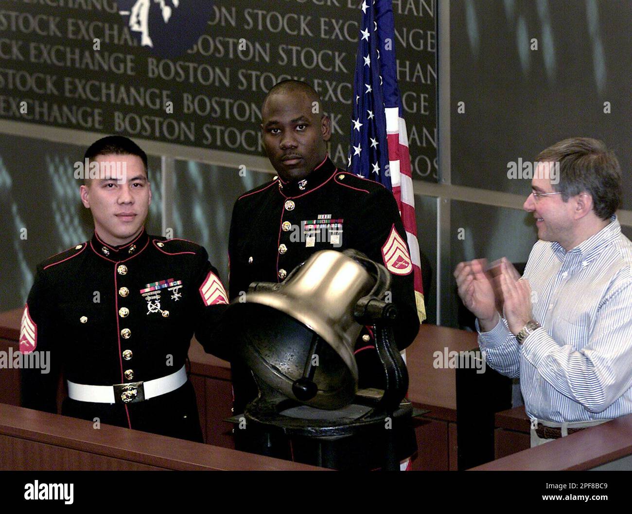 US Marine Corps Staff Sgt. Sinh Ly, left, and US Marine Corps Staff Sgt ...