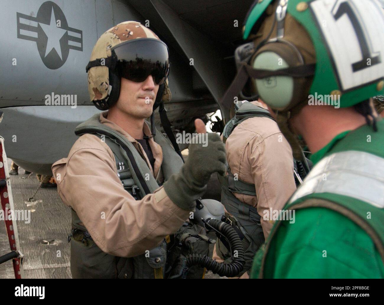 F-14A Tomcat pilot Lt. Cmdr. Brady Barstosh, of Houston, Texas, gives a ...