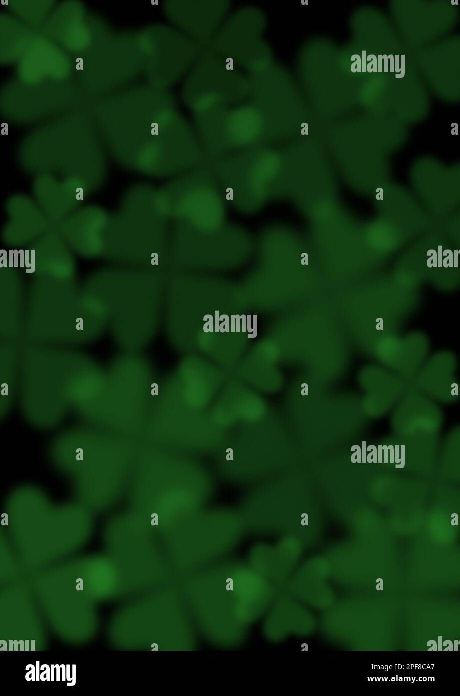 Blurred green clovers on the dark background. Abstract background Stock ...