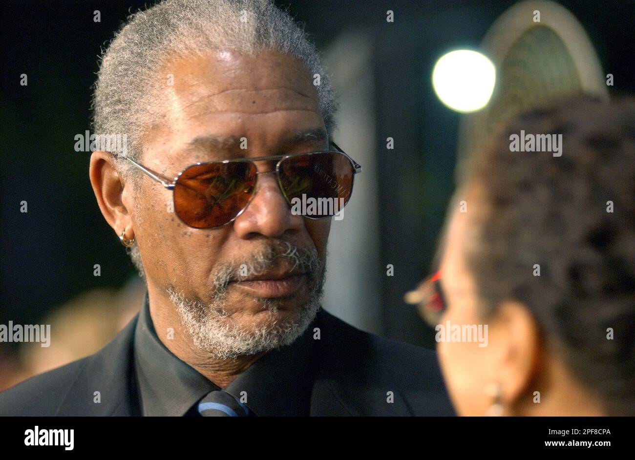 Morgan Freeman looks at his wife, Myrna, on the red carpet at the ...