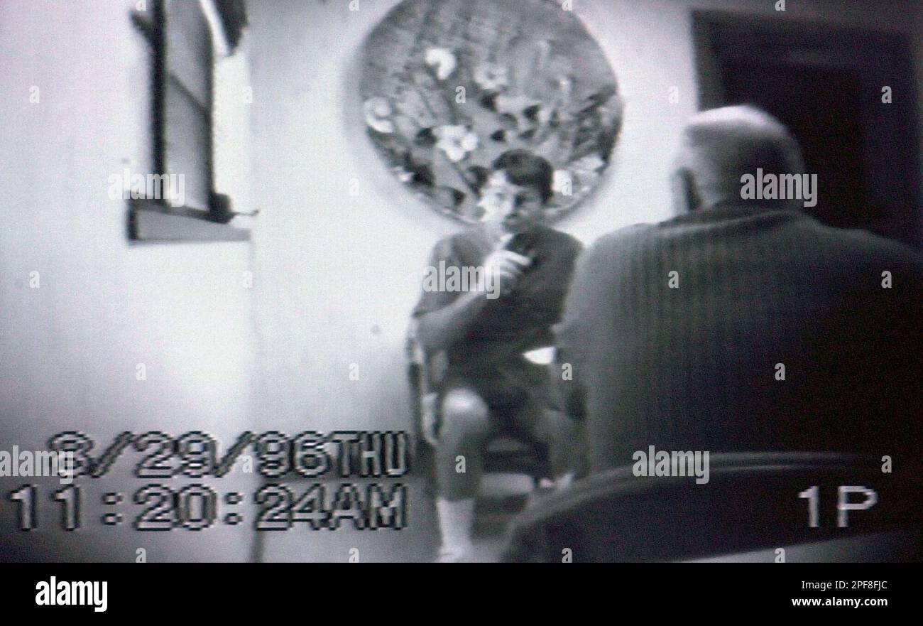 Alan Mackerley, center facing camera, urges friend Bill Anderson to be ...