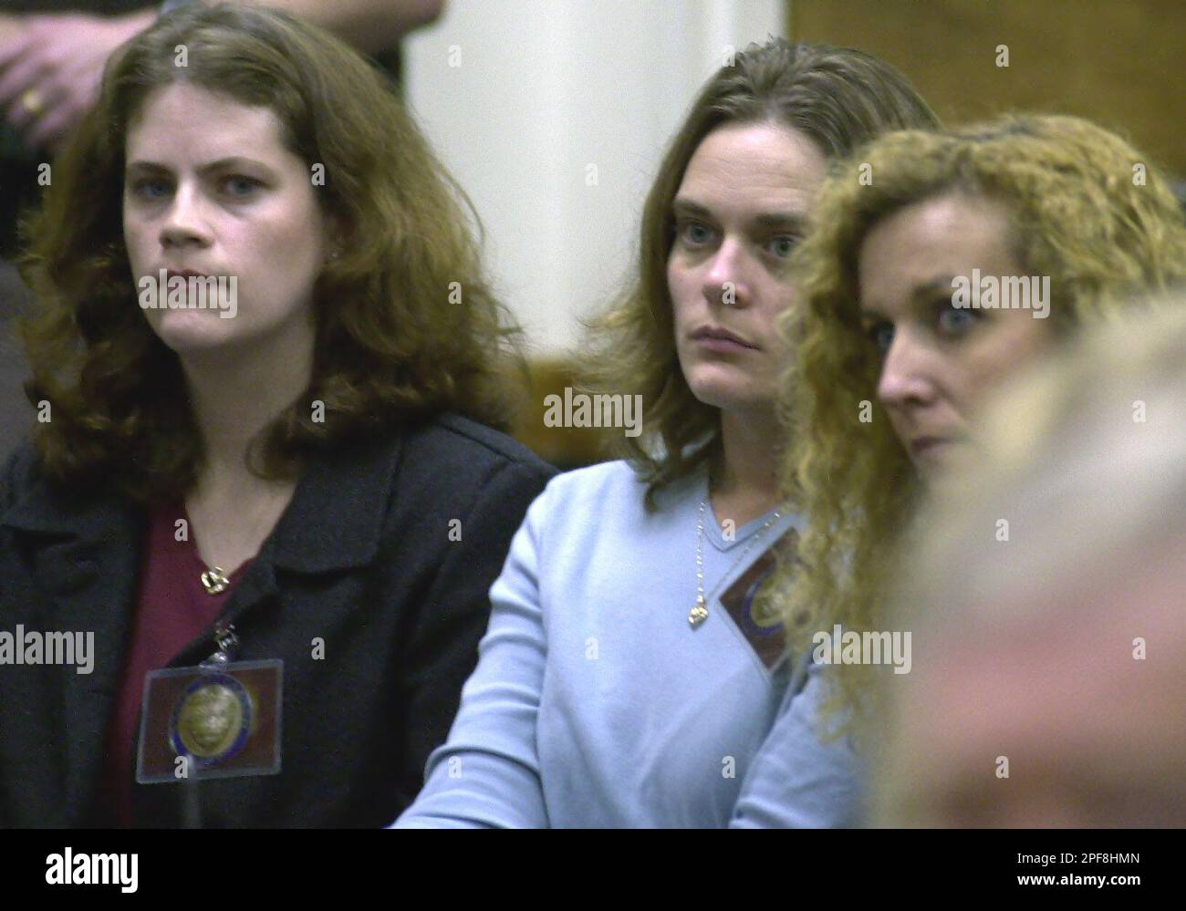 Penny Dupuie, right, sister of murder victim MaryJane Longo, center ...