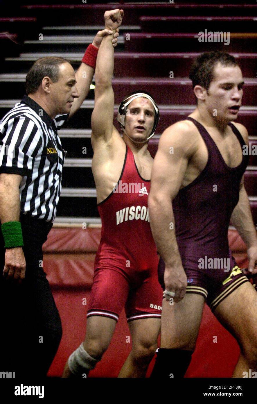 Wisconsin 141-pound wrestler Tyler Laudon looks to the home crowd after ...