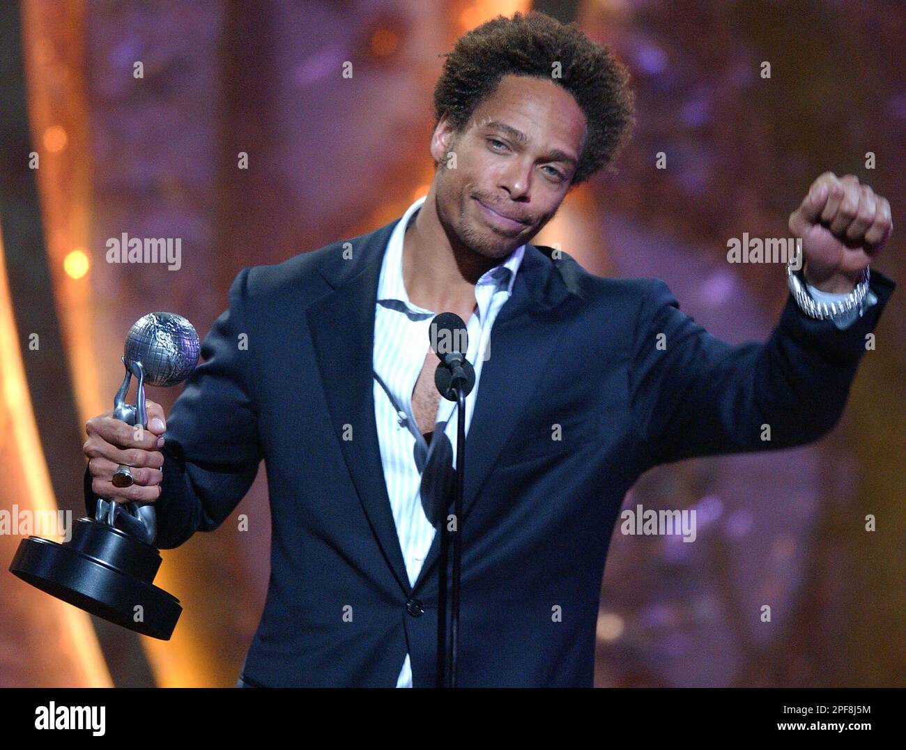 Gary Dourdan accepts the award for Outstanding Supporting Actor in a ...