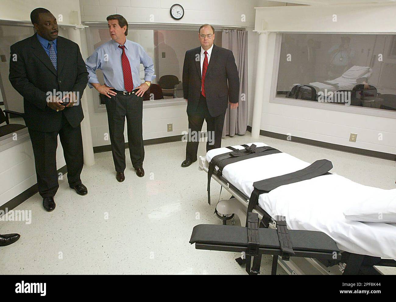 Holman Correctional Facility Warden Grantt Culliver, left, explains the ...