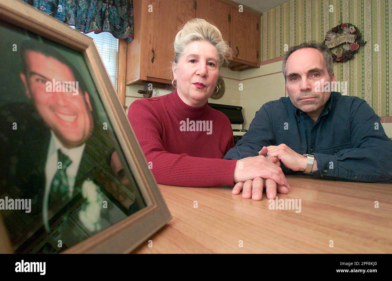 ** ADVANCE FOR WEEKEND, MARCH 8-10 ** A photo of Steven Mancini sits on ...