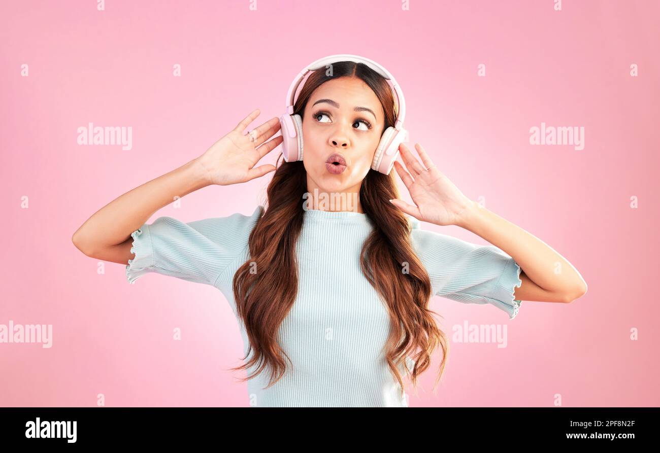 Music headphones, singing and woman whistle in studio isolated on a ...