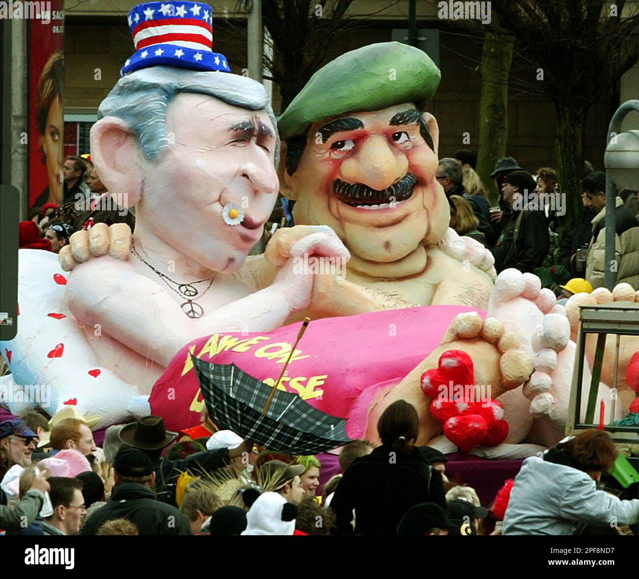U.S. President George W. Bush. left, and Iraqi President Saddam Hussein ...