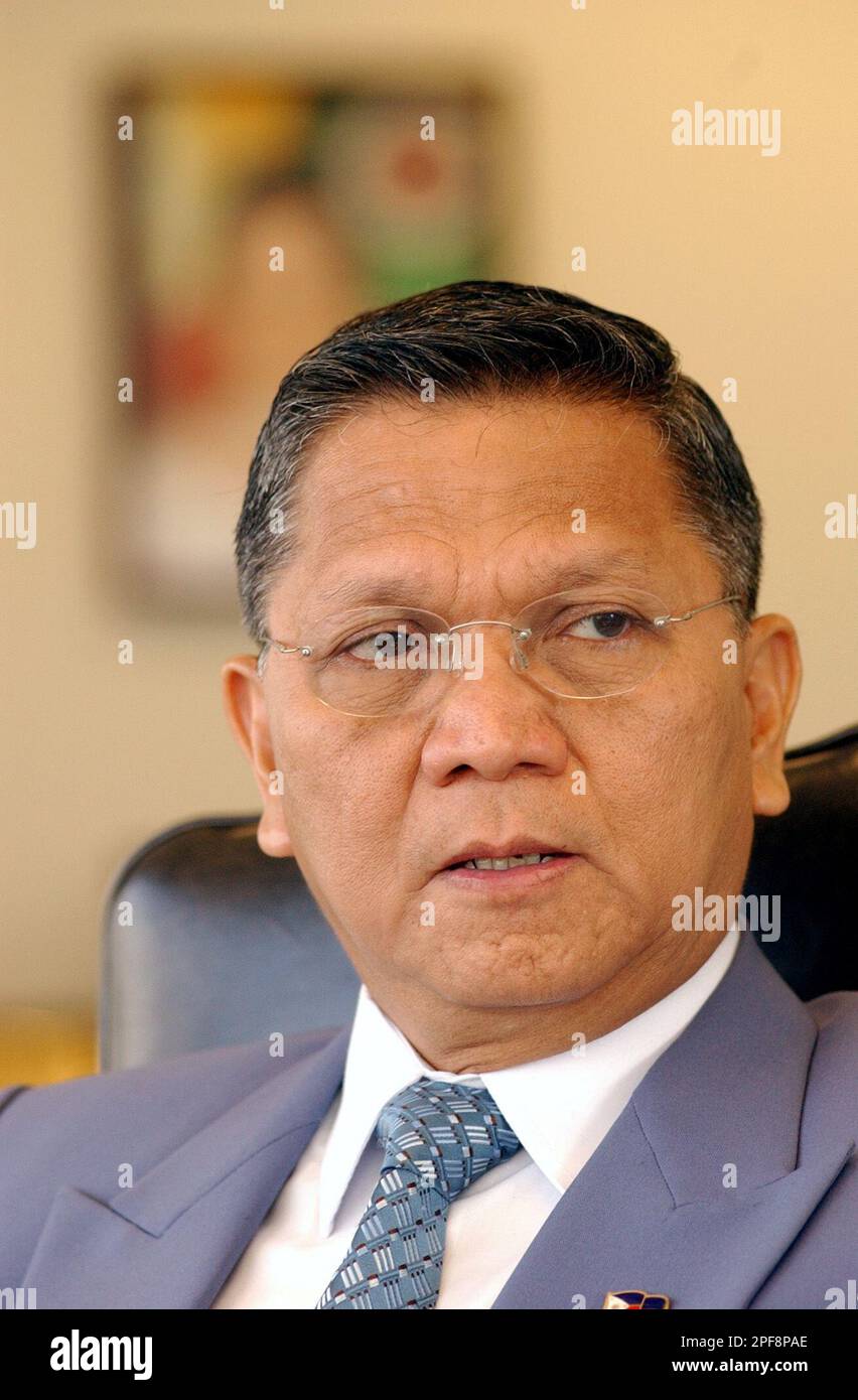 Philippine Defense Secretary Angelo Reyes is interviewed at the ...