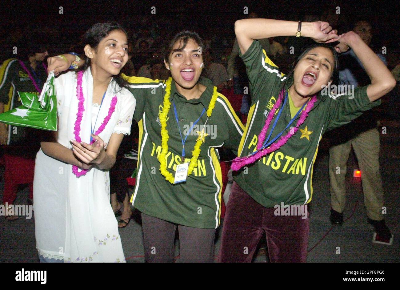 Pakistani girls celebrate the performance of their team playing against ...