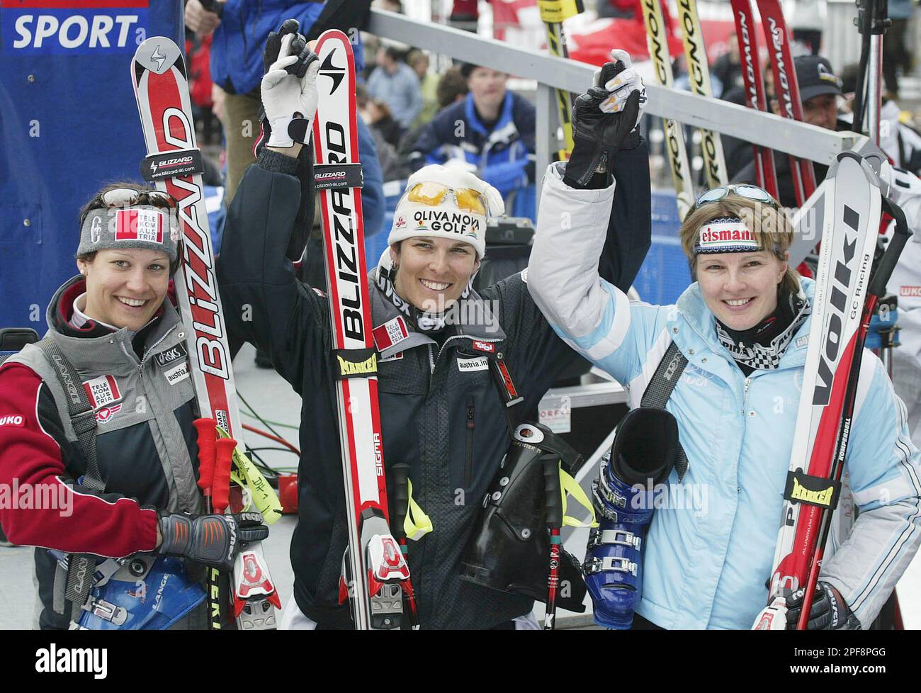 Winner Michaela Dorfmeister from Austria, center, poses for ...