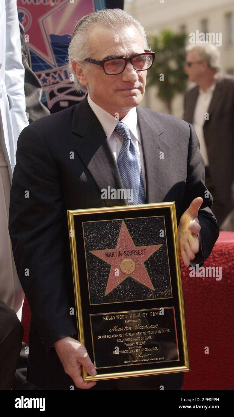 Director Martin Scorsese holds his new star on the Hollywood Walk of ...