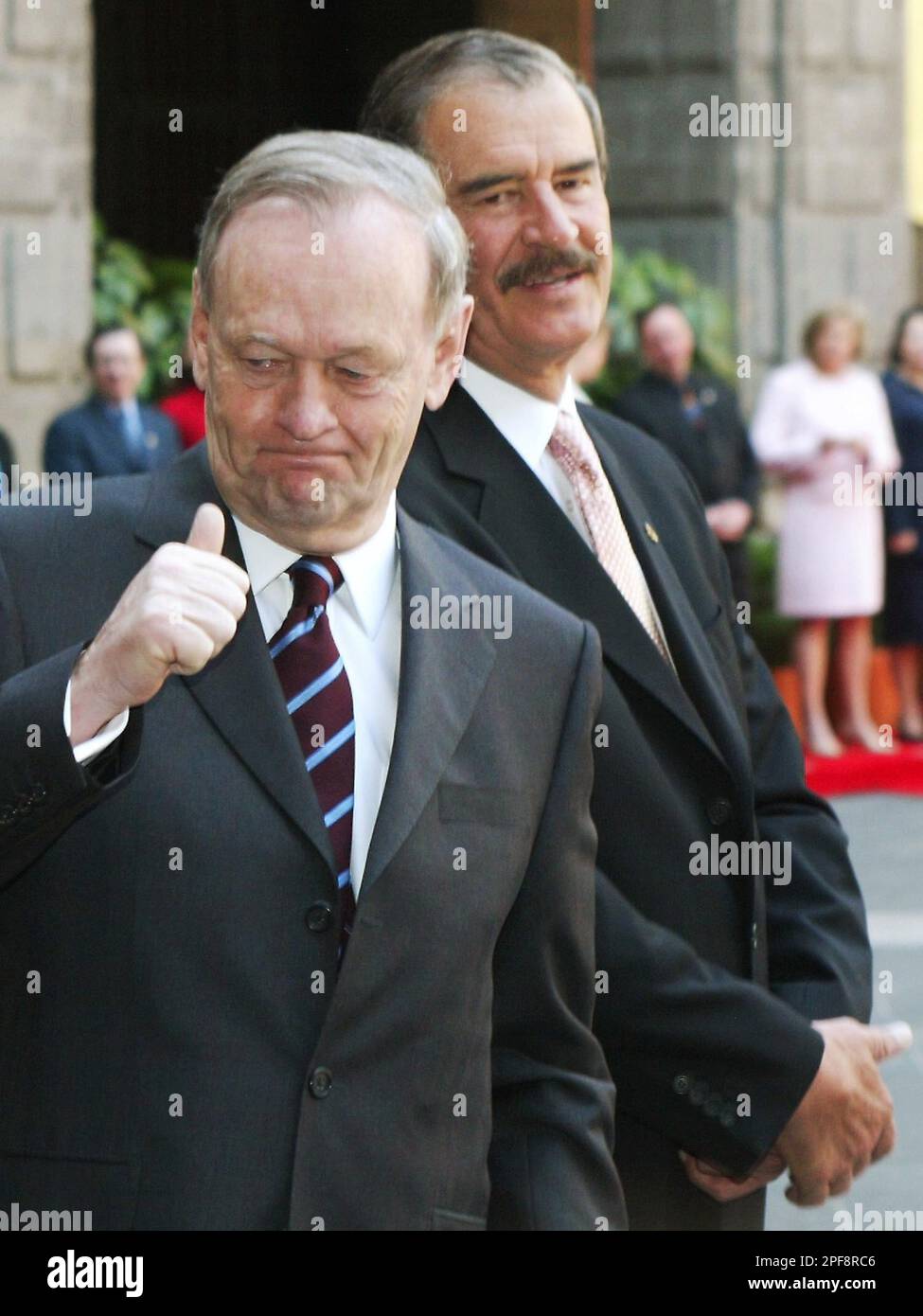 Canadian Prime Minister Jean Chretien gives the thumbs-up as Mexican ...