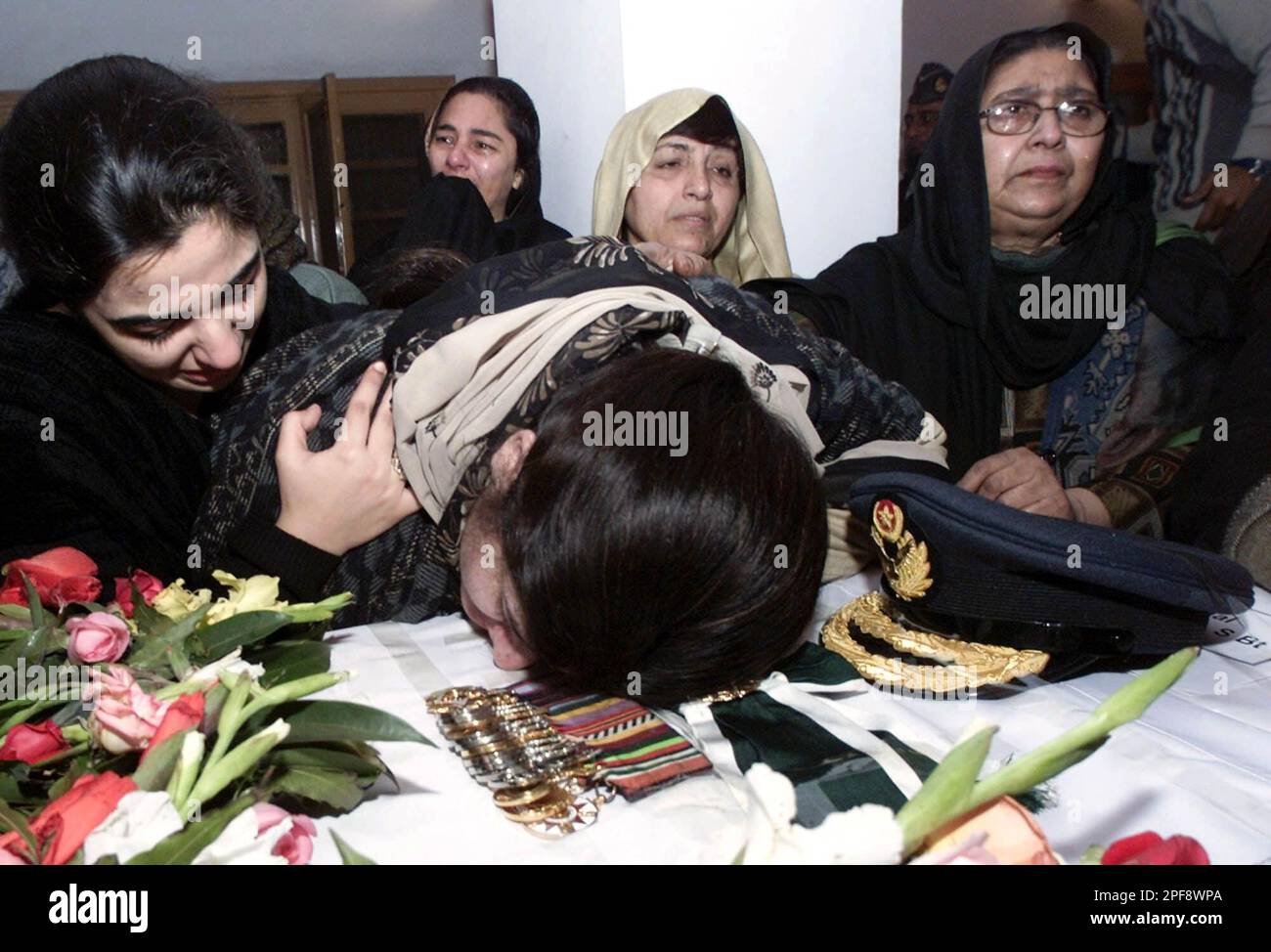 Minahil Fatima, center, daughter of Pakistan air force chief Mushaf Ali ...