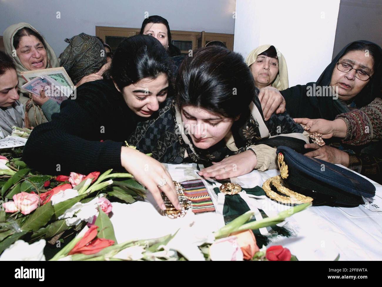 Minahil Fatima, center, daughter of Pakistan air force chief Mushaf Ali ...