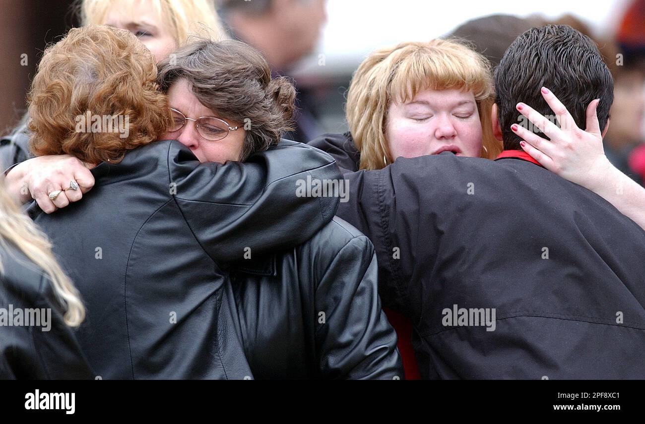 Family members of Arnold Peters, a worker injured in an explosion at ...
