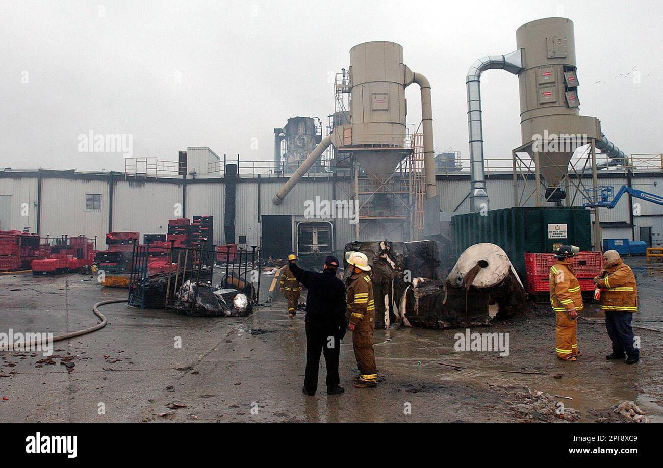 Members of the Corbin fire department survey the damage to the CTA ...