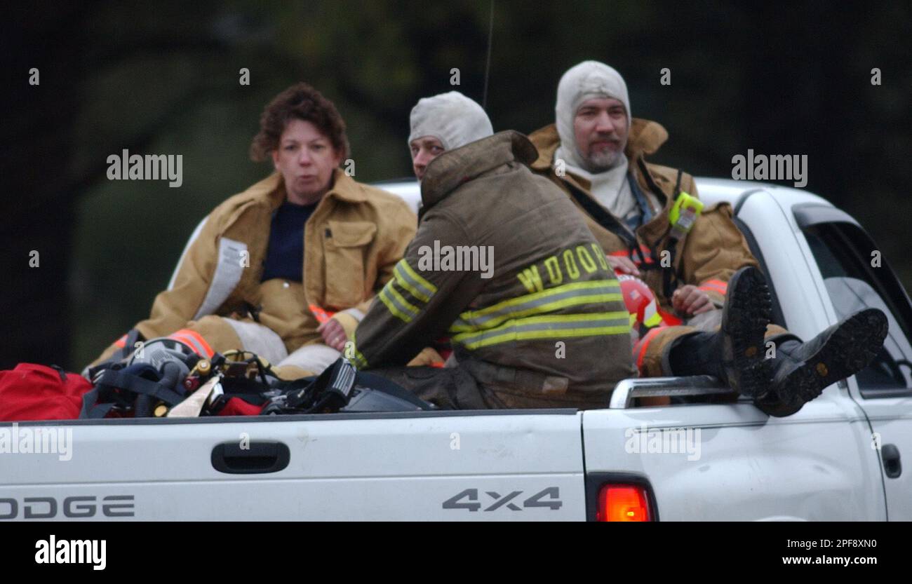 Firefighters leave the scene of the CTA Acoustics plastics plant in ...