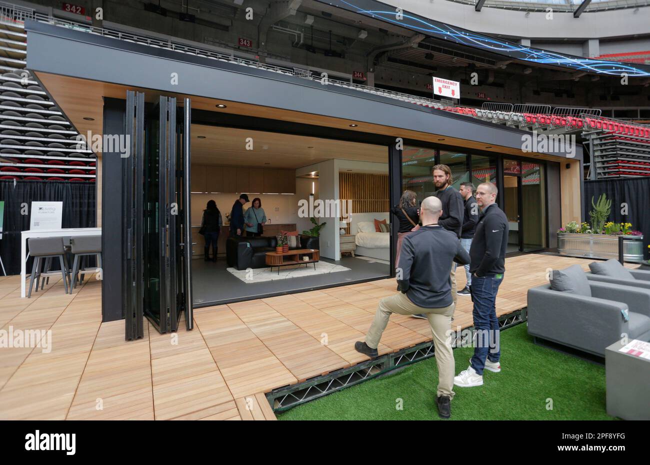 Vancouver, Canada. 16th Mar, 2023. People view a modular home design at ...