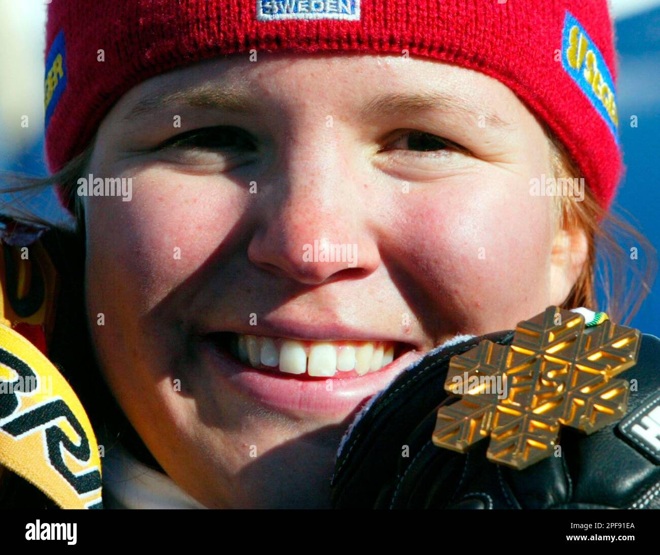 Swedish Anja Paerson displays the gold medal she won the women's giant ...