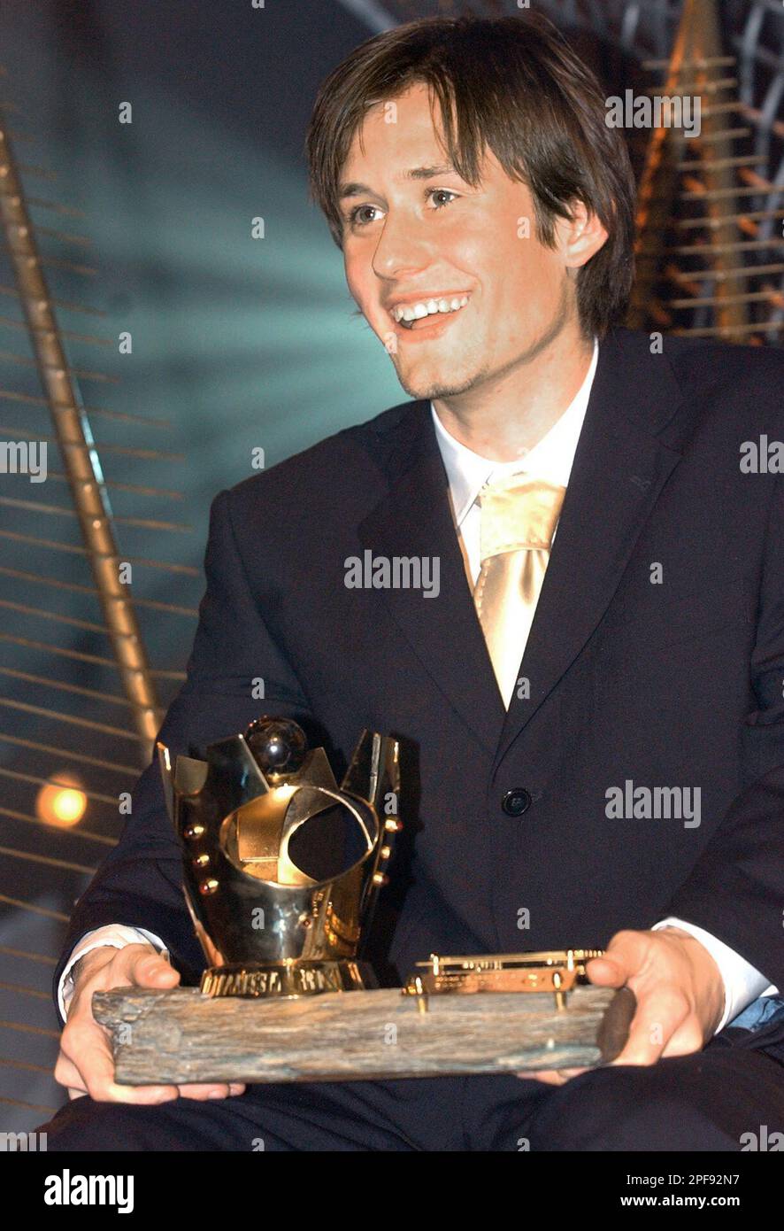 Borussia Dortmund midfielder Tomas Rosicky holds his trophy after being ...