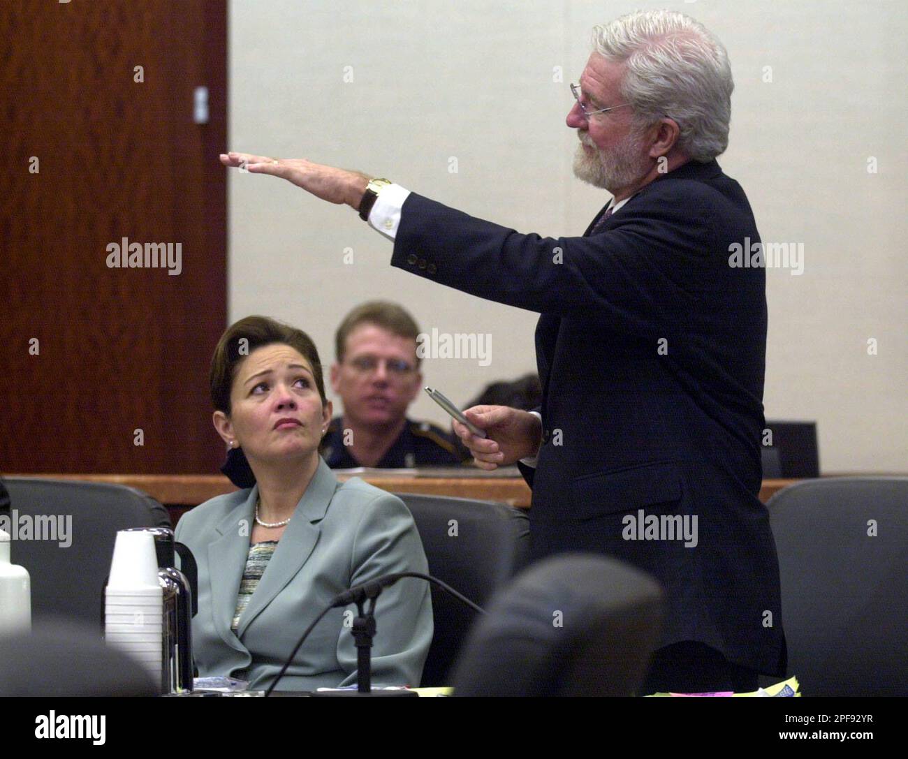 Murder defendant Clara Harris watches as her attorney George Parnham ...