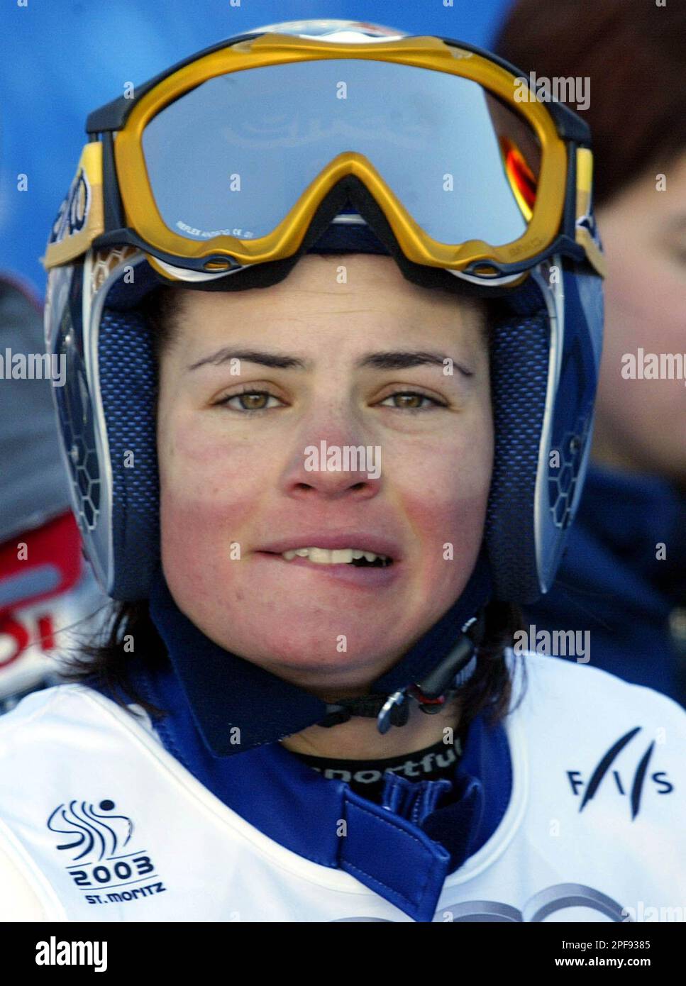 Italy's Karen Putzer waits in the finish area after completing the ...