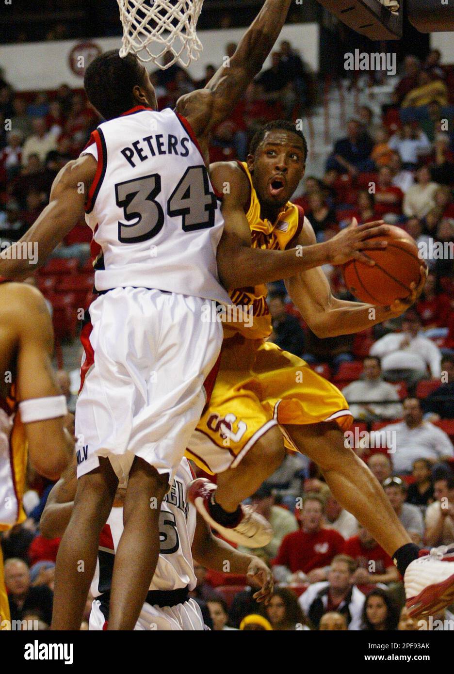 Southern California guard Errick Craven makes a pass around UNLV ...