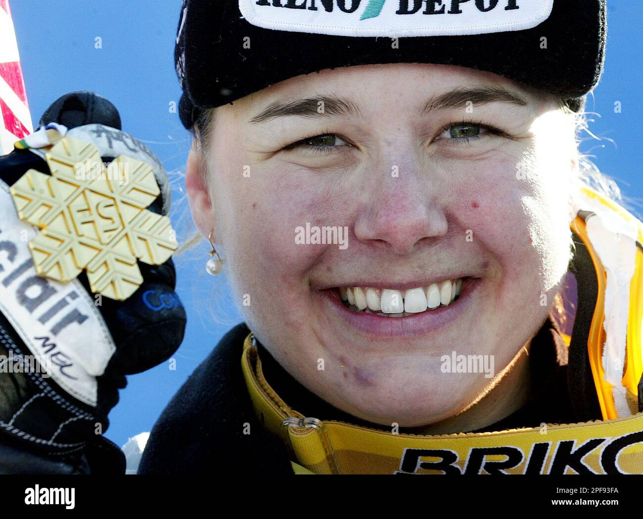 Canadian Melanie Turgeon displays the gold medal she won in the women's ...