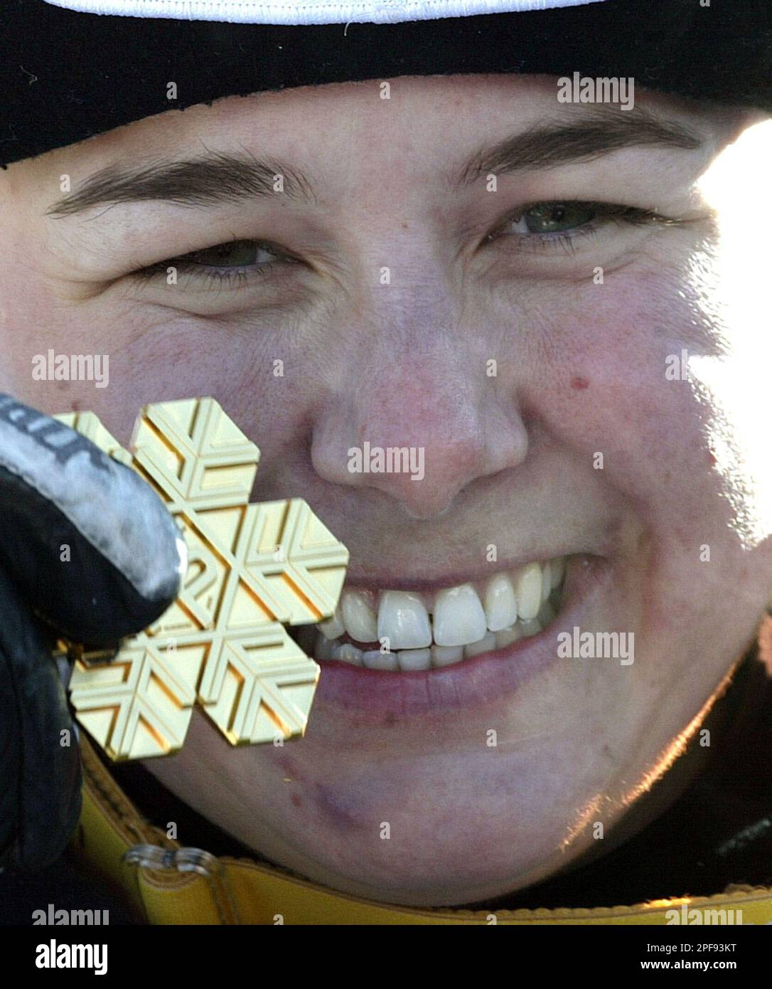 Canadian Melanie Turgeon displays the gold medal she won in the women's ...