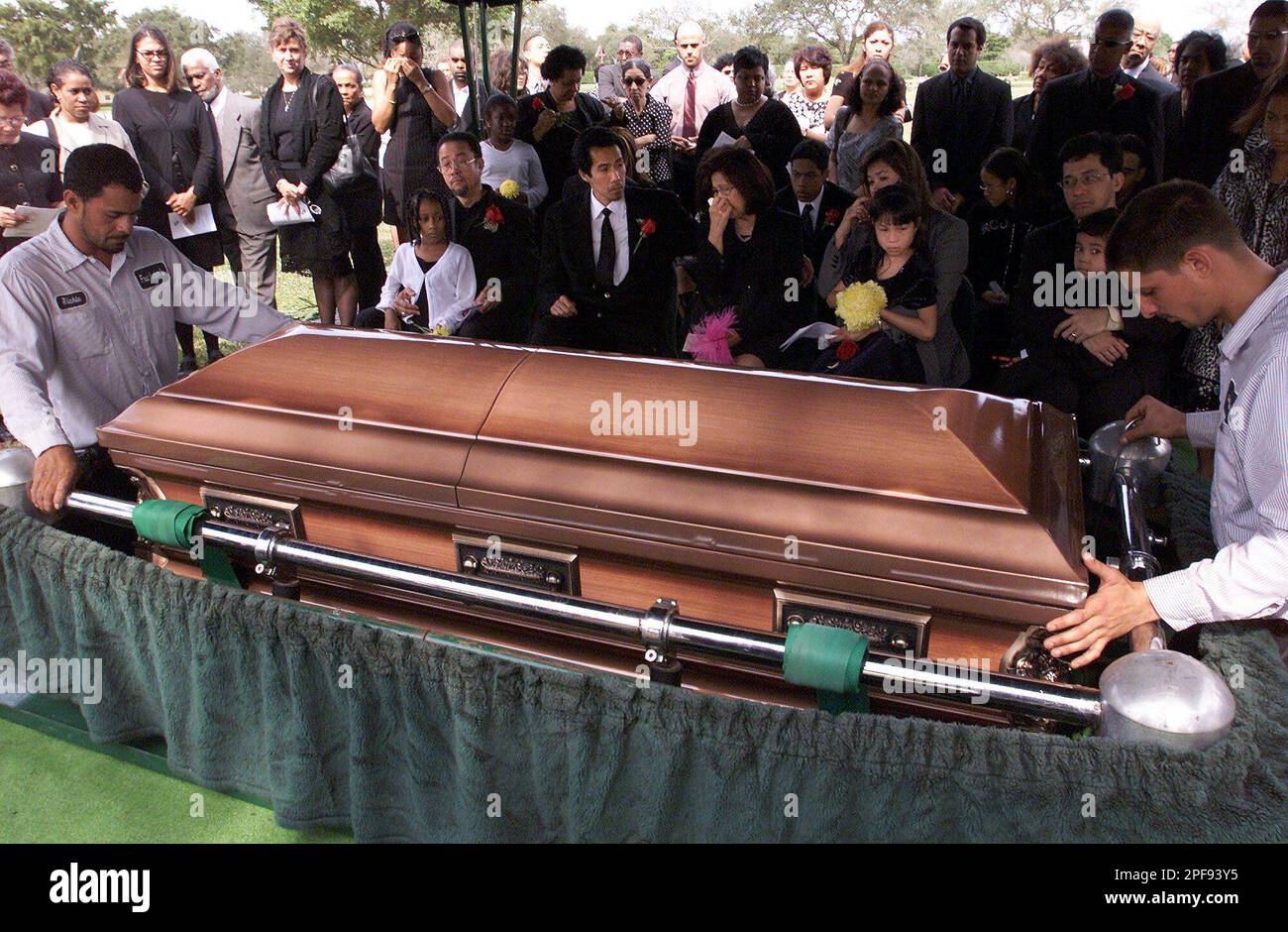 Family and friends of pioneering reggae producer Vincent "Randy" Chin ...