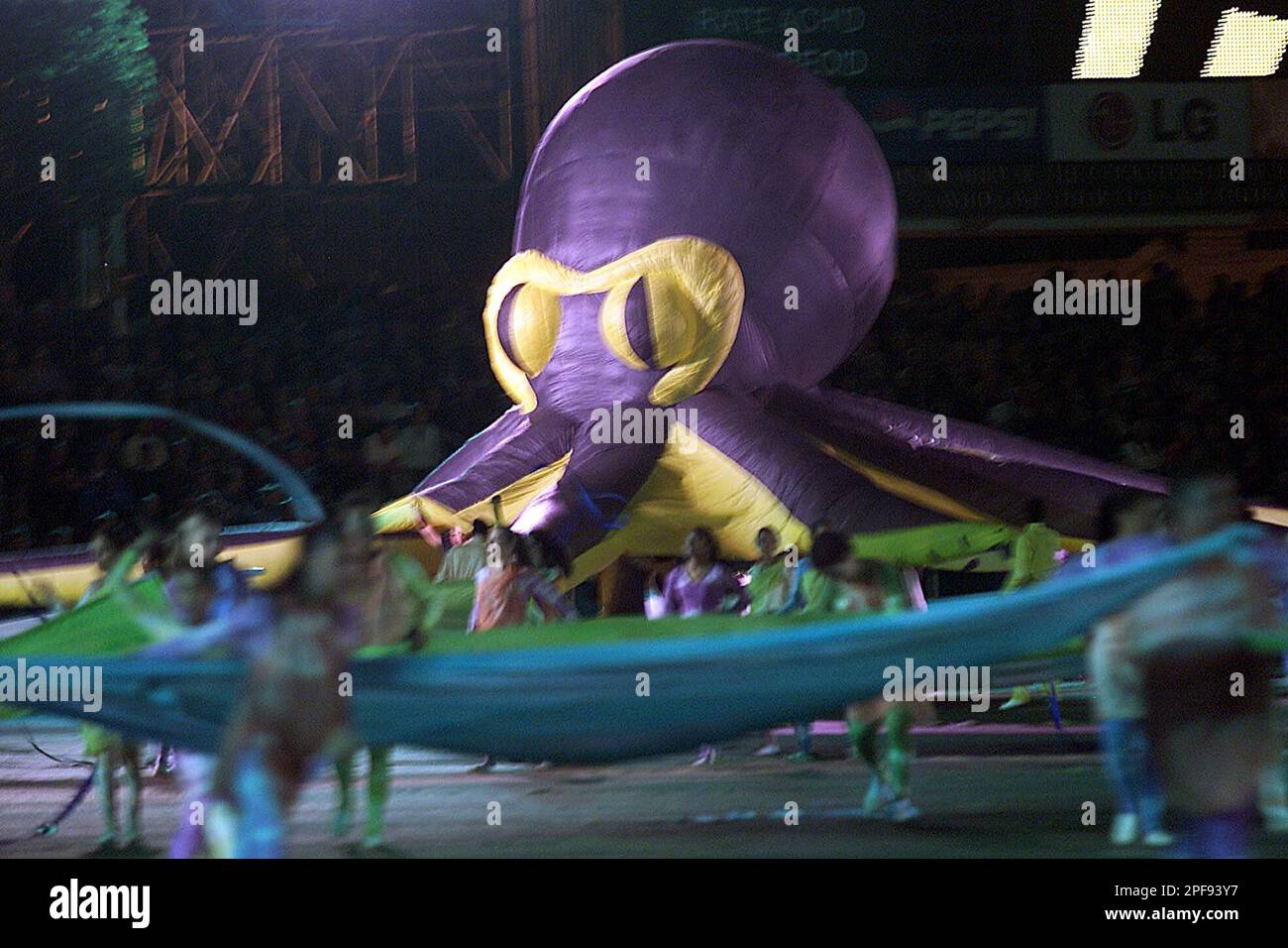 A model of an octopus enters the field during the opening cermony of ...