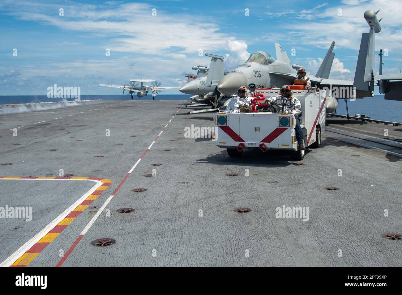230315-N-WM182-1020 PHILIPPINE SEA (March 15, 2023) An E-2C Hawkeye ...