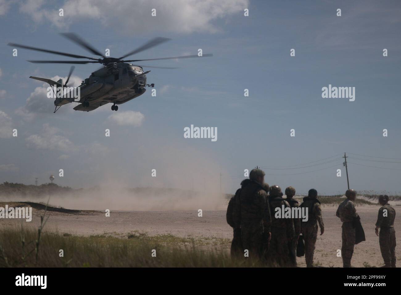 Marines and Sailors with 1st Marine Raider Battalion conduct helocast ...