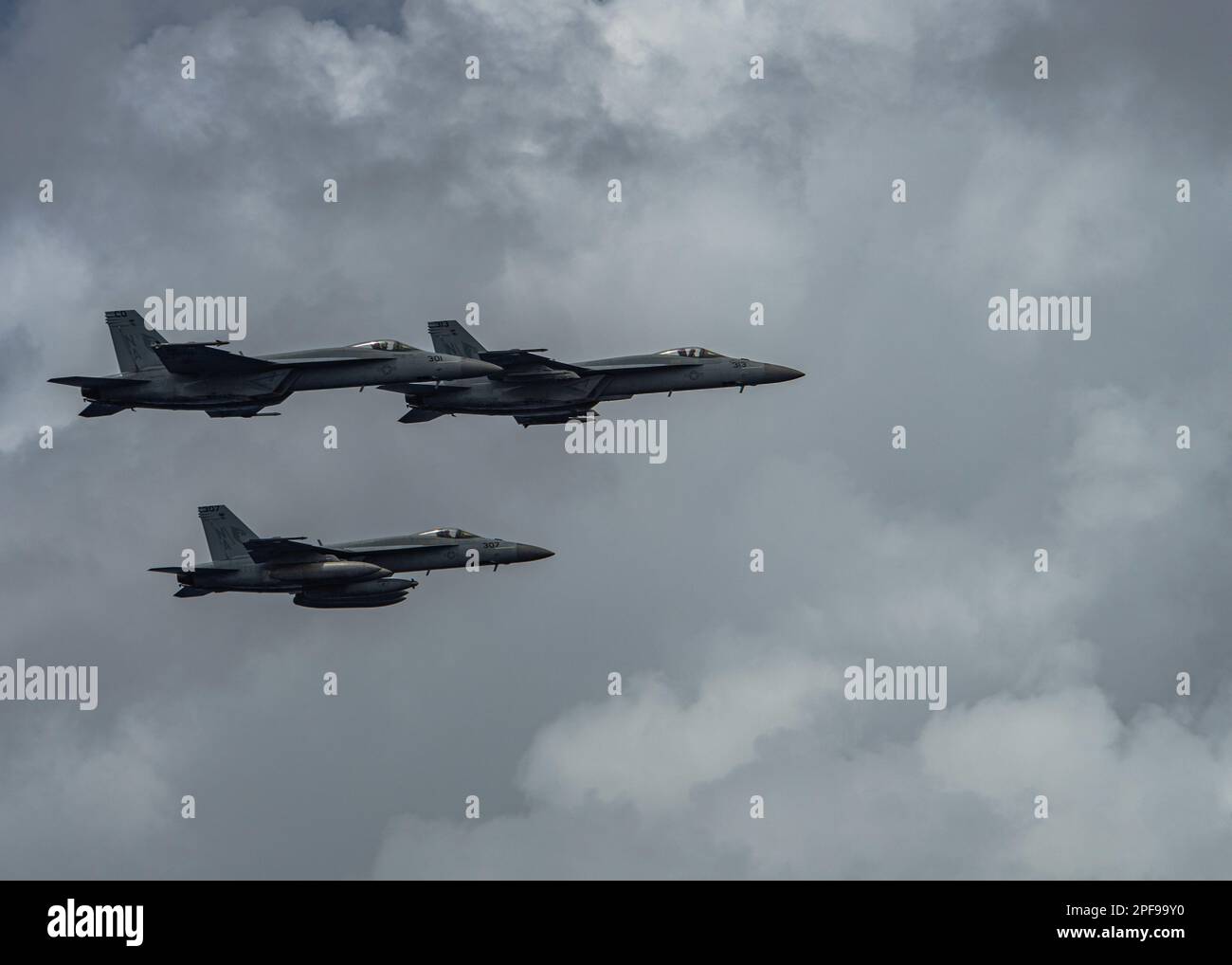 230316-N-MH015-1127 PHILIPPINE SEA (March 16, 2023) Three F/A-18E Super Hornets from the ...