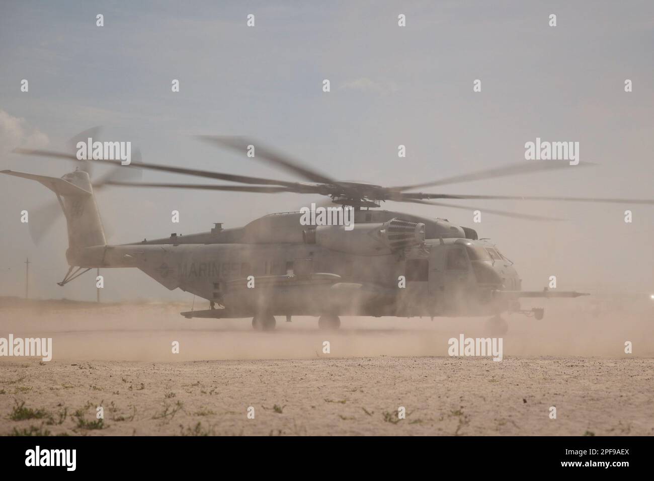 Marines and Sailors with 1st Marine Raider Battalion conduct helocast ...