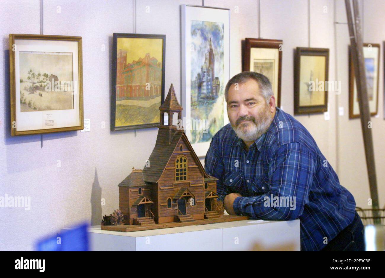 Atlantic City historian Robert Ruffolo stands next to a copper ...