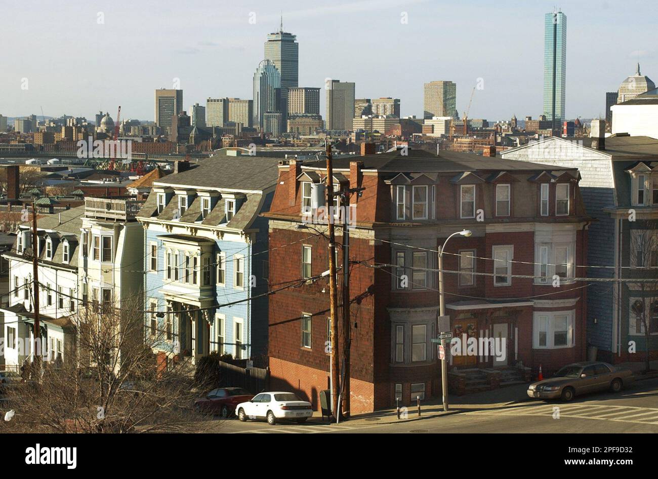 South Boston triple-deckers are seen in foreground with the downtown ...
