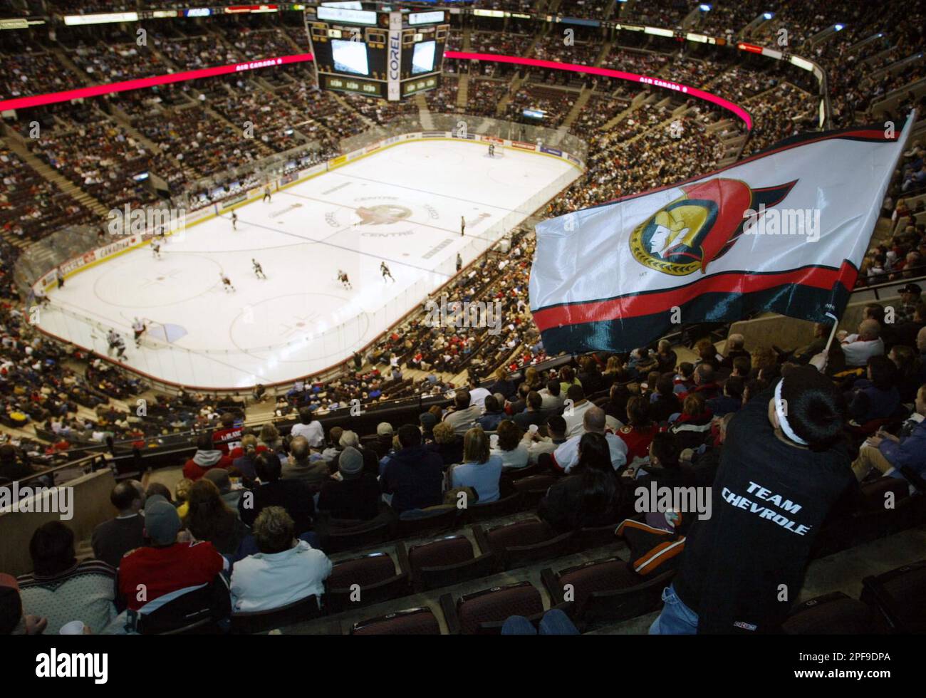 Ottawa Senators fan Jeff Lalor waves a team flag during the start of ...