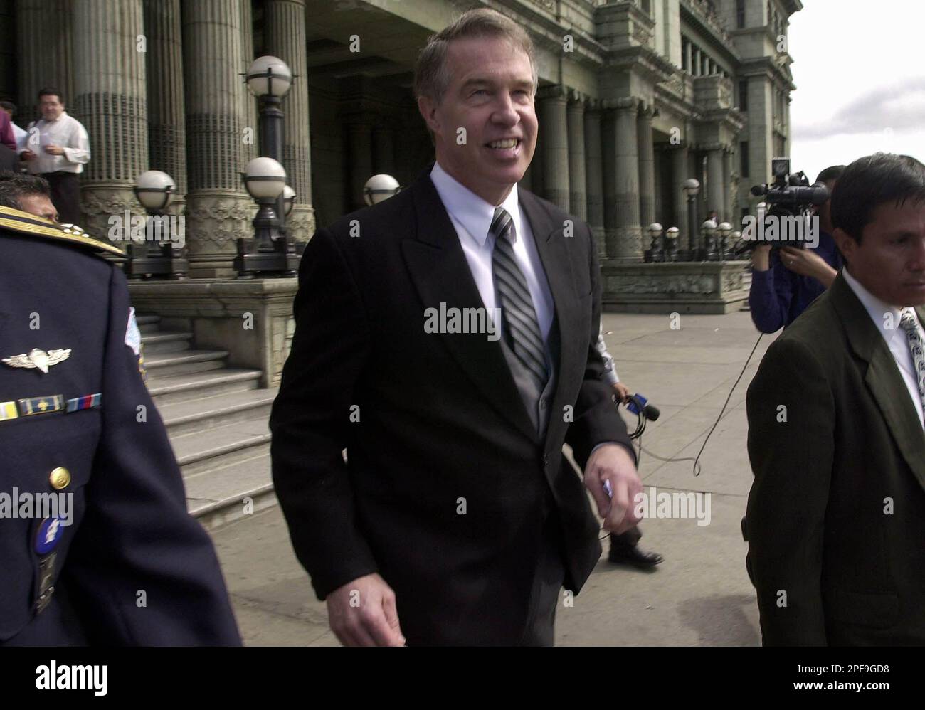 The new U.S. ambassador, John Hamilton, leaves the National Palace ...