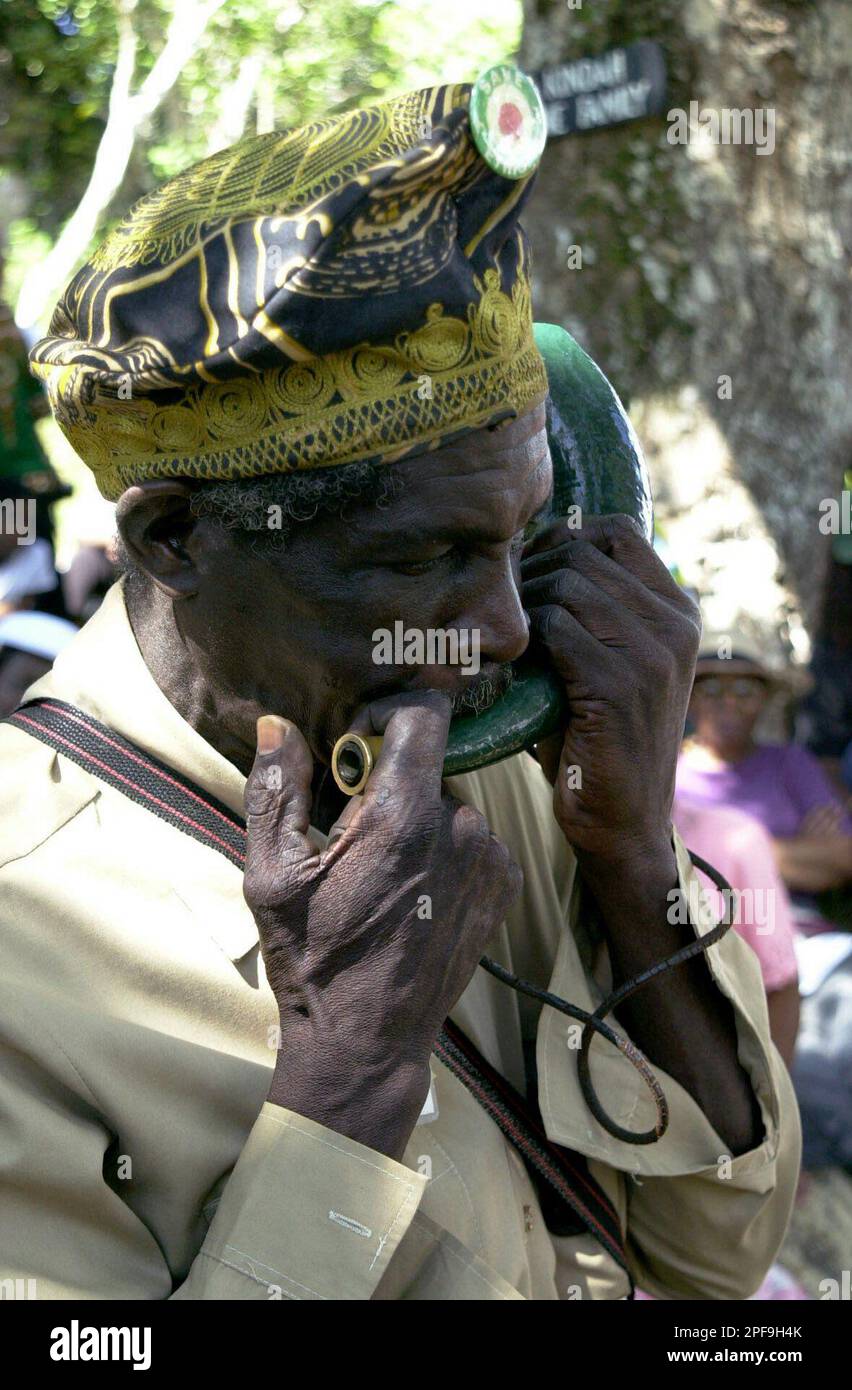 A maroon warrior blows the abeng in Accompong, Jamaica, Monday, Jan. 6 ...