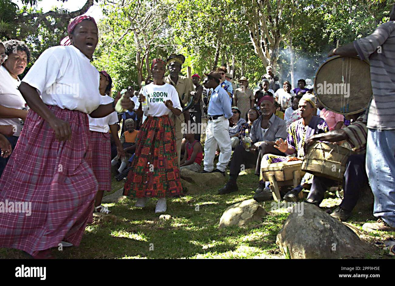 Maroon women dance under the kinder tree in Accompong, Jamaica, Monday ...